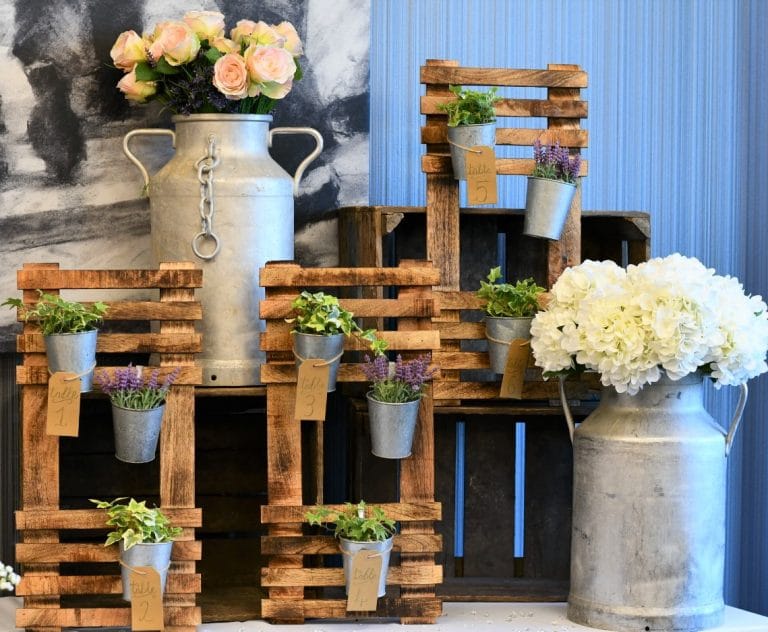 Rustic Table Plan With Flower Pots - AB Event Hire